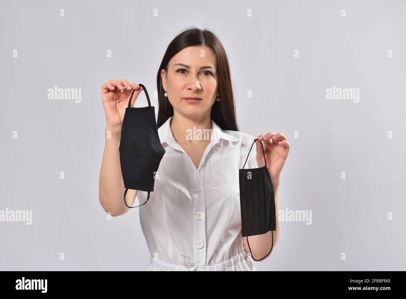 Person using protective face mask hi-res stock photography and images ...