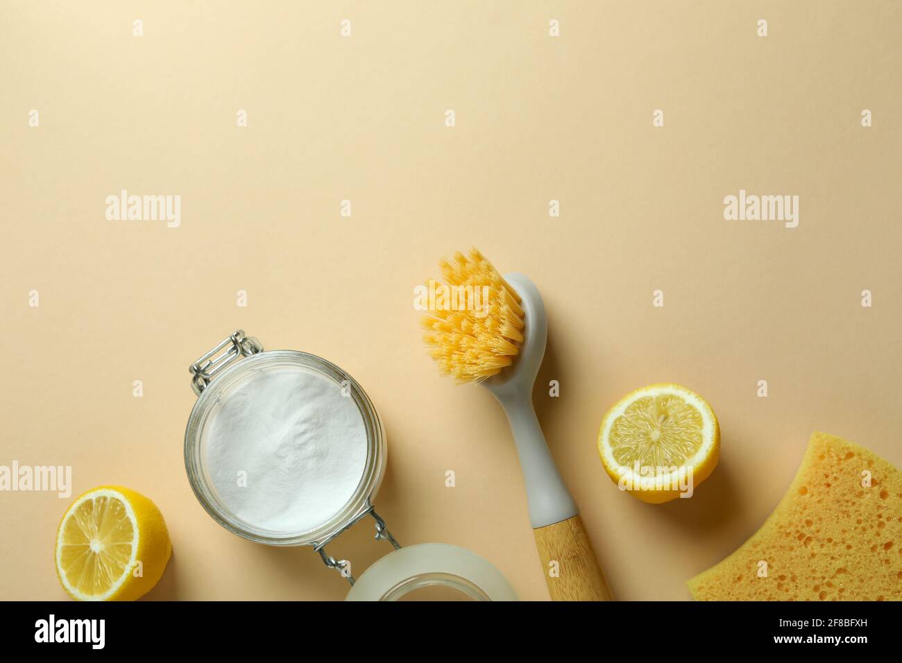 Cleaning concept with eco friendly cleaning tools on beige background ...
