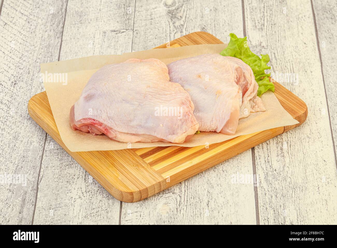 Raw chicken hip ready for cooking Stock Photo - Alamy