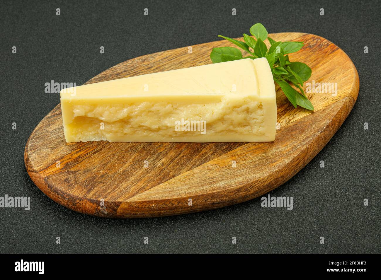 Hard parmesan cheese served basil leaves Stock Photo - Alamy