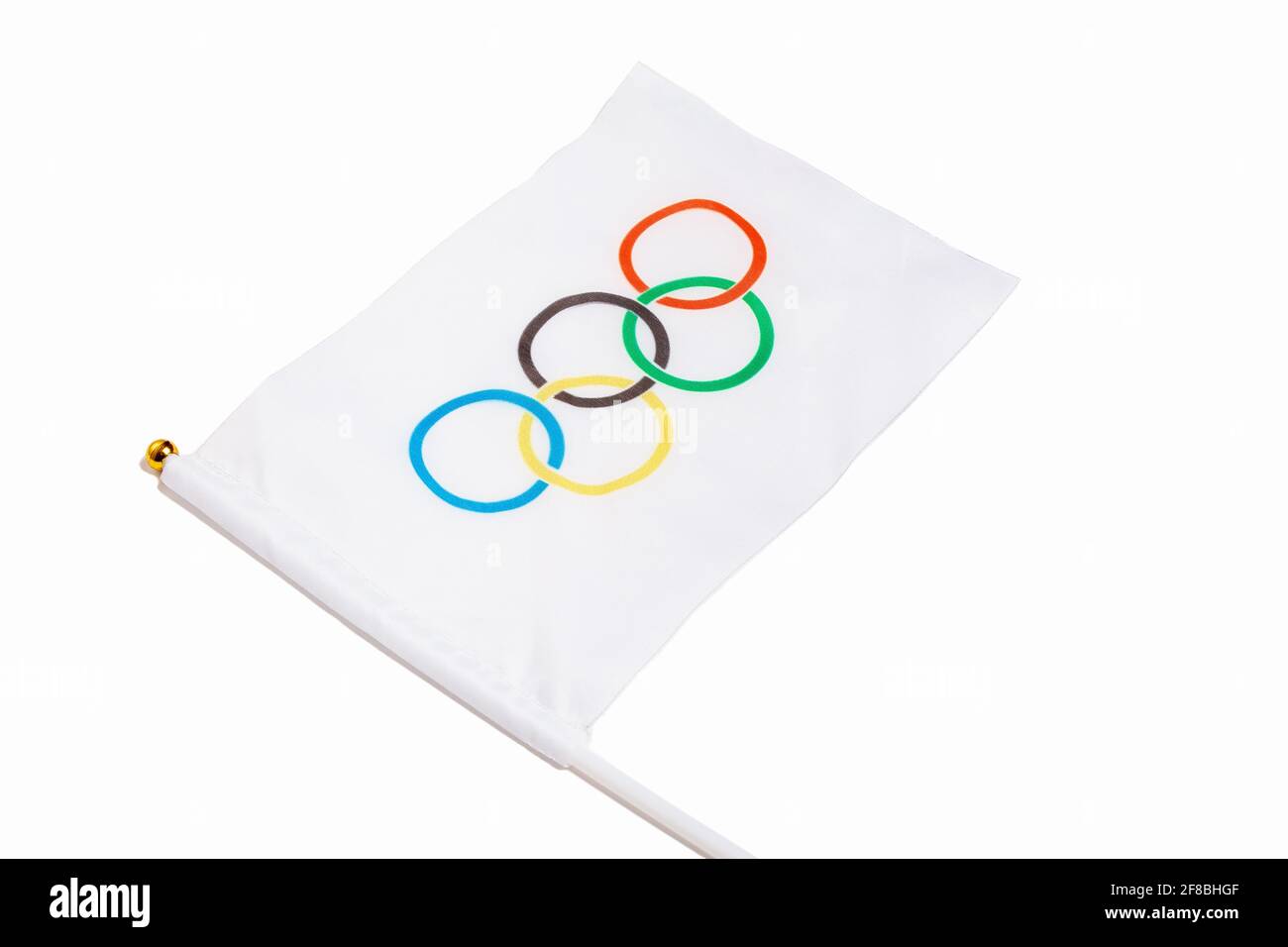 Miniature Olympic flag on a white background. Olympic Games symbol ...