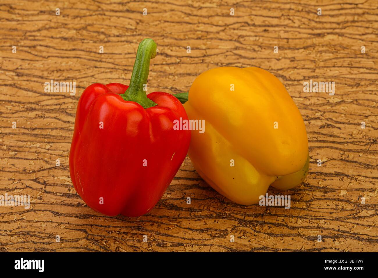 Two Ripe sweet Bulgarian bell peppers Stock Photo - Alamy