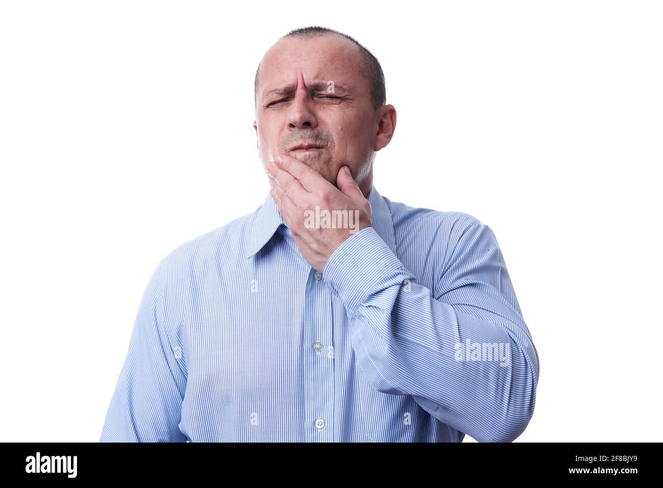 Caucasian businessman with a strong tooth ache isolated on white ...