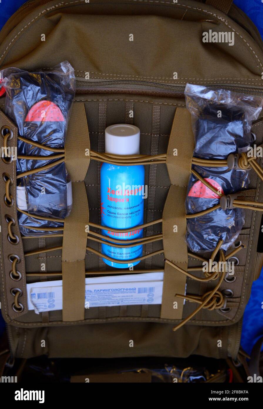 Backpack with soldier s first aid kit: bandages, wound-healing drugs ...