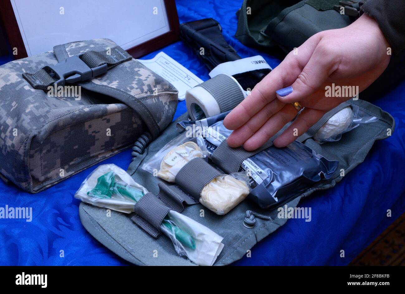 Backpack with soldier s first aid kit: bandages, wound-healing drugs ...