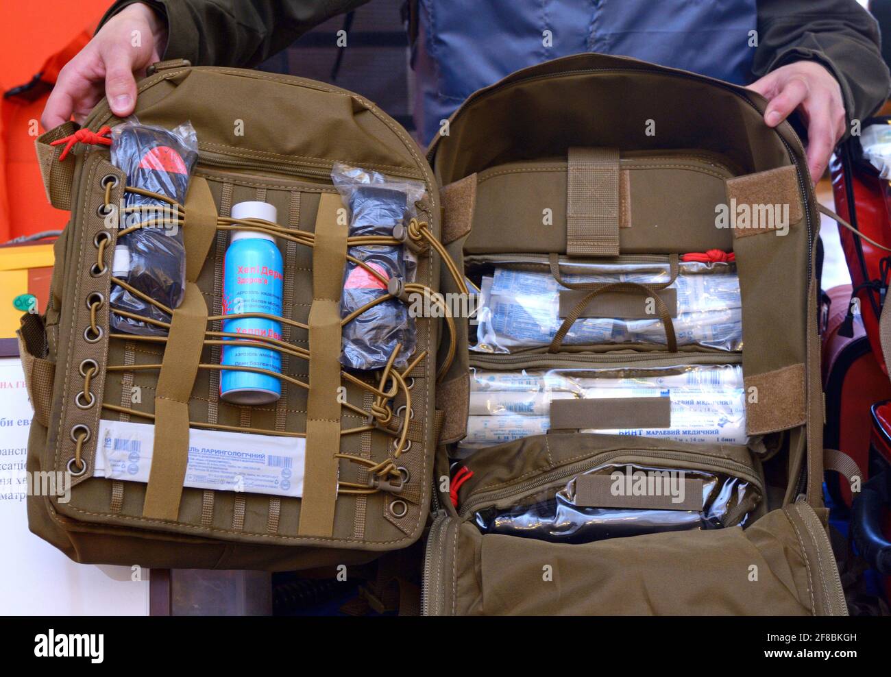 Backpack with soldier s first aid kit: bandages, wound-healing drugs ...