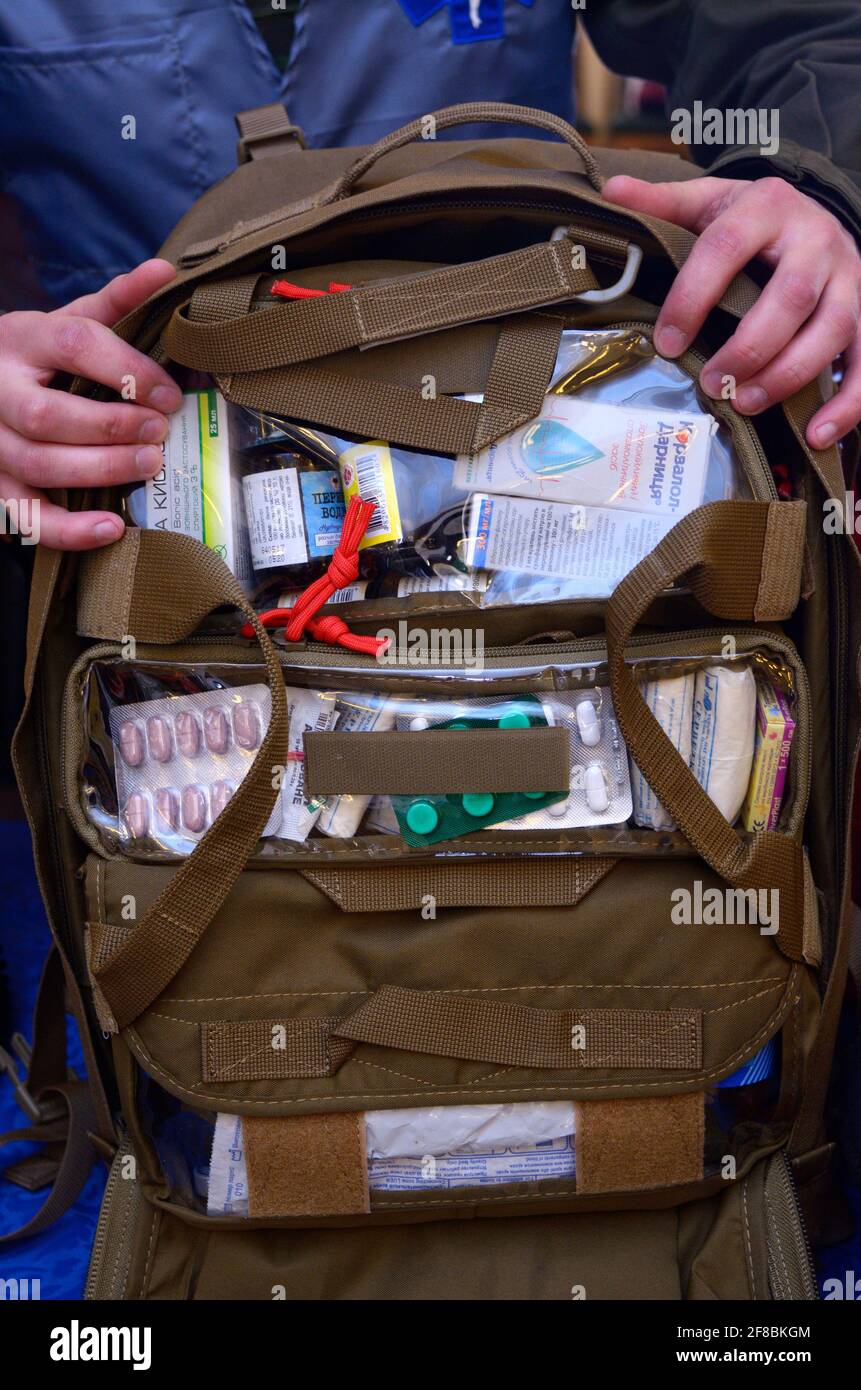 Backpack with soldier s first aid kit: bandages, wound-healing drugs ...