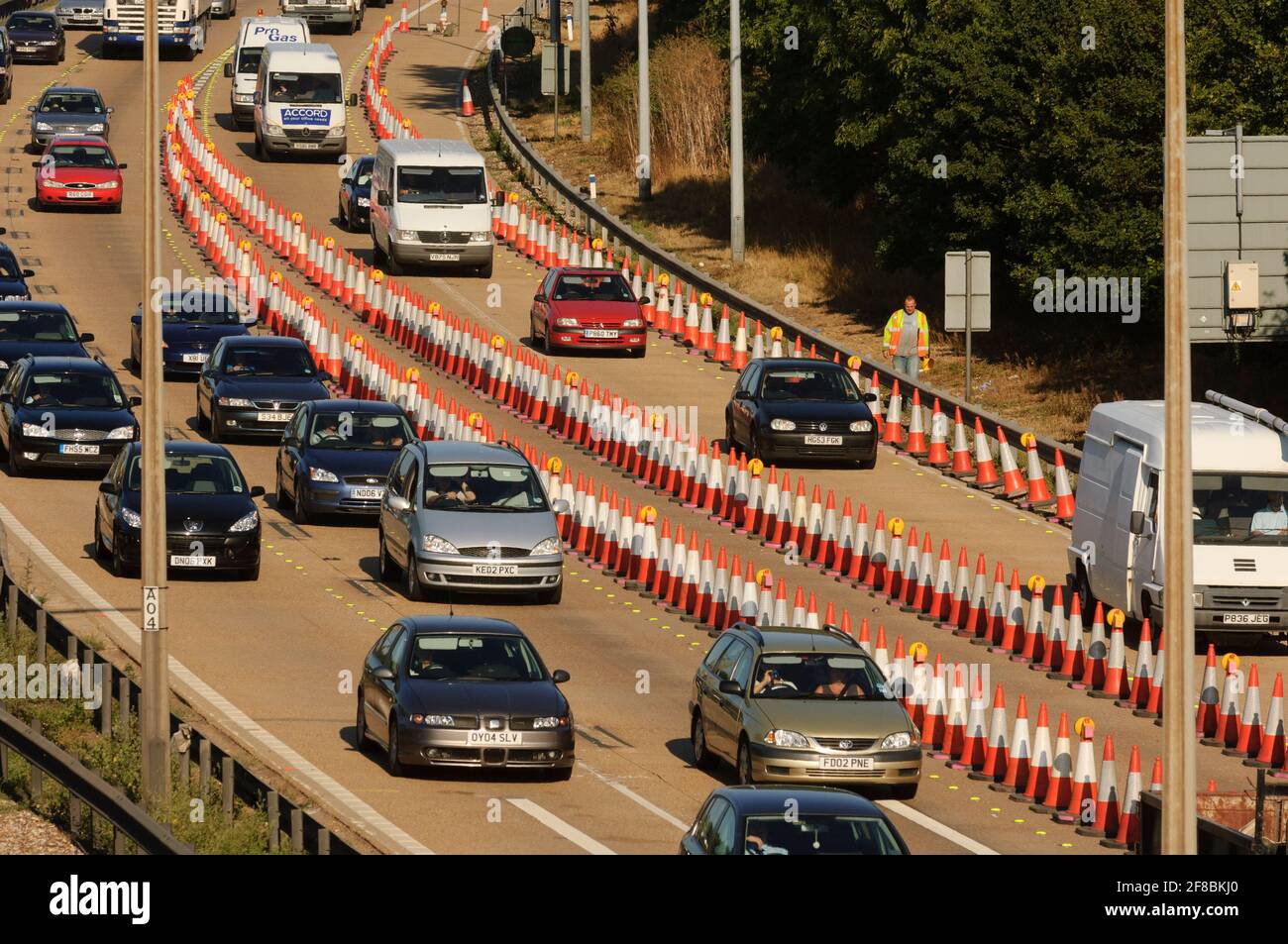Traffic going through roadworks, M25 motorway between near Theydon Bois ...