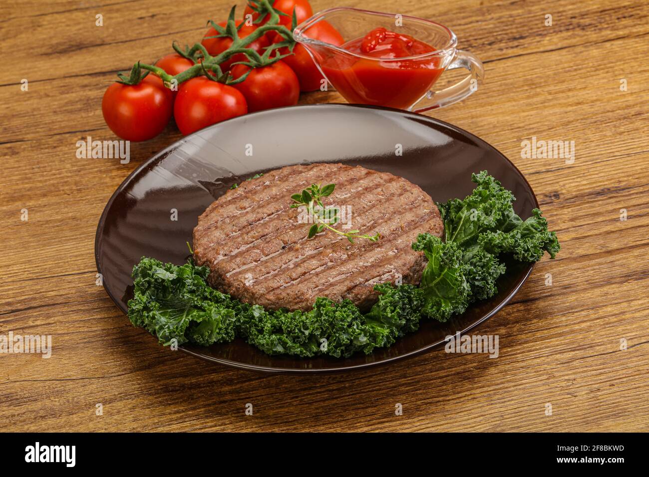 Grilled tasty beef cutlet for burger Stock Photo - Alamy