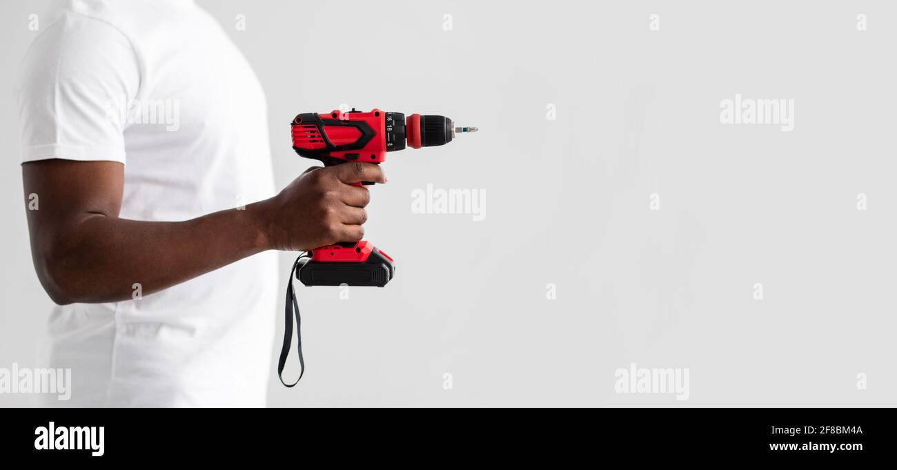 African american construction handyman holding hi-res stock photography ...