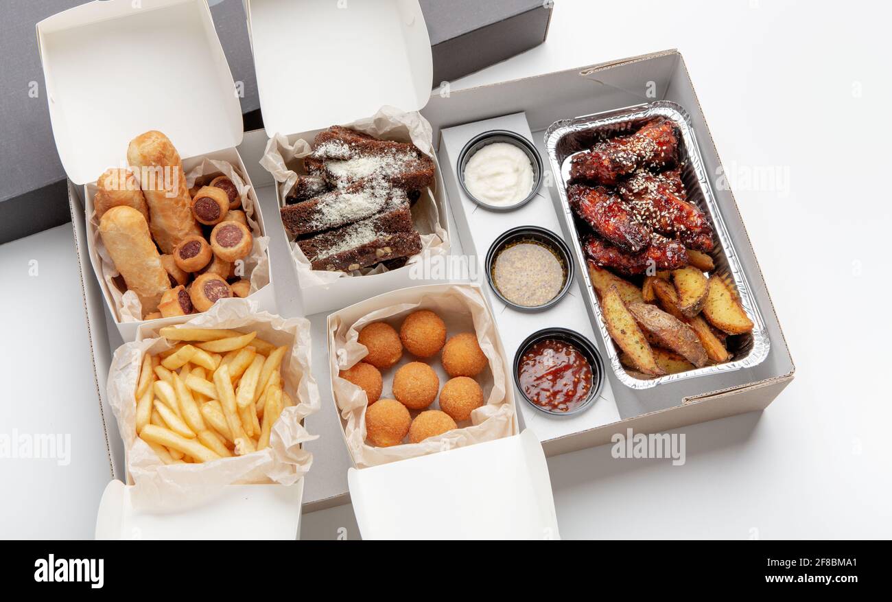 Junk meal, tasty snacks, modern fast food menu and delivery to client ...