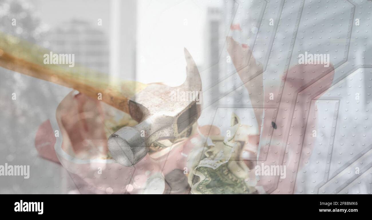 Office buildings and a broken piggy bank Stock Photo - Alamy