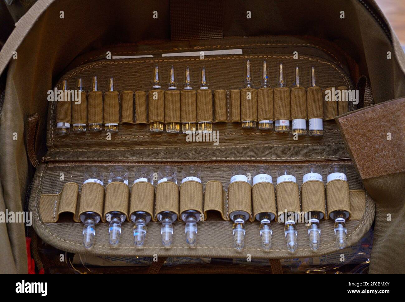 Soldier first aid kit: ampoules, painkillers closeup Stock Photo - Alamy