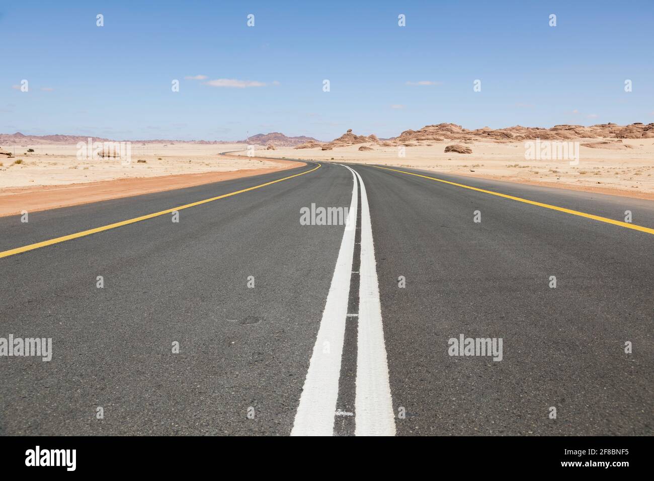 Typical road in Saudi Arabia that leads through the desert Stock Photo ...