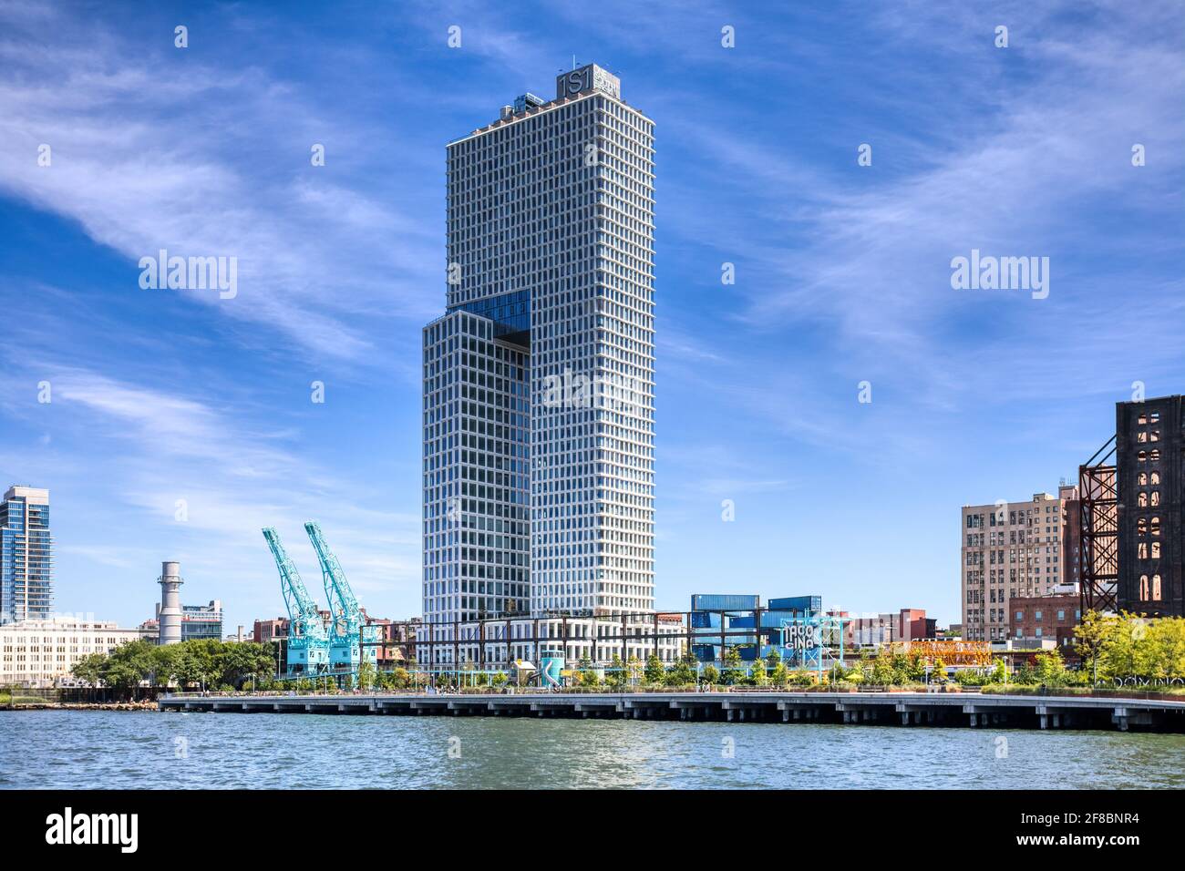 One South First Street, an apartment tower, leans on Ten Grand Street ...
