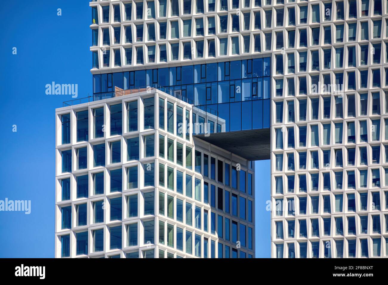 One South First Street, an apartment tower, leans on Ten Grand Street ...