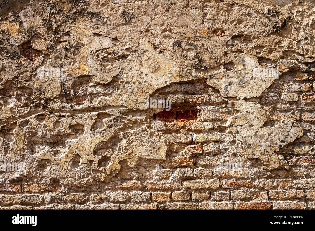 Old brick and plaster wall texture background. Painted distressed wall ...