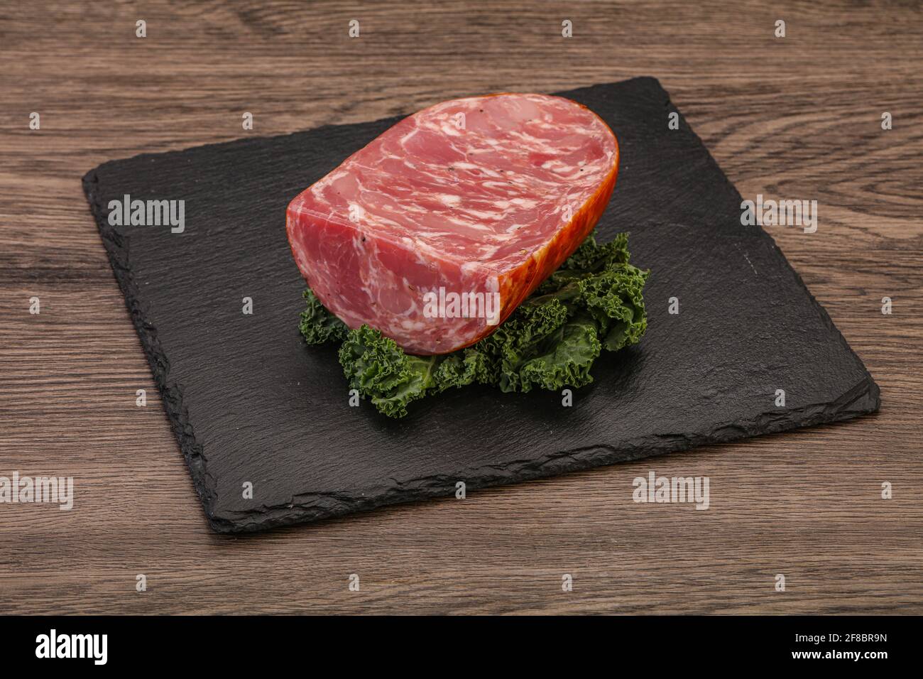 Tasty Beef ham piece over board Stock Photo - Alamy