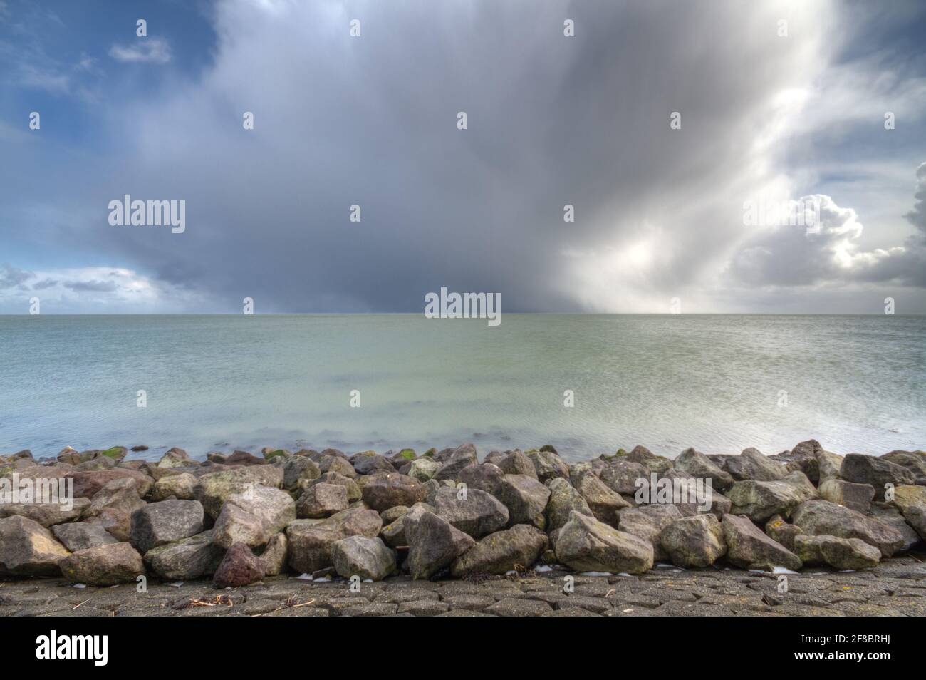 Toe protection of a solid sea dike, made of heavy boulders, under wild ...