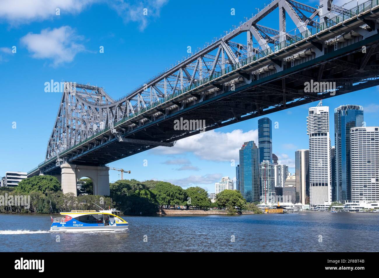The Story Bridge over the Brisbane River with the Brisbane skyline in ...