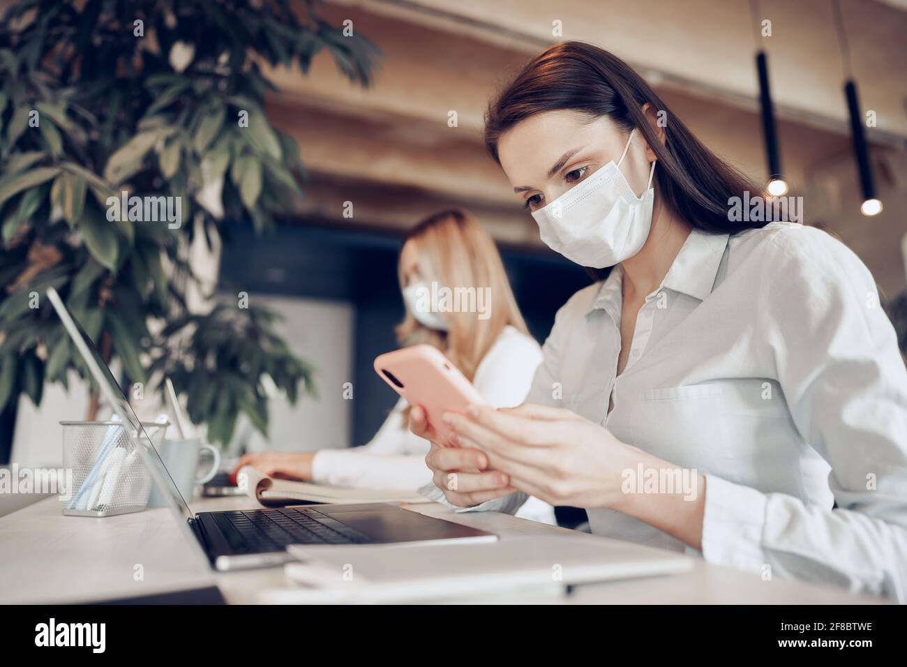 Employee job worker working face mask masks hi-res stock photography ...