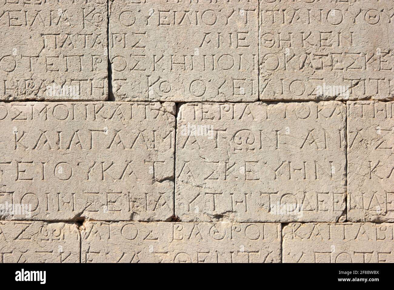 Old Medieval inscription carved on stone Stock Photo - Alamy