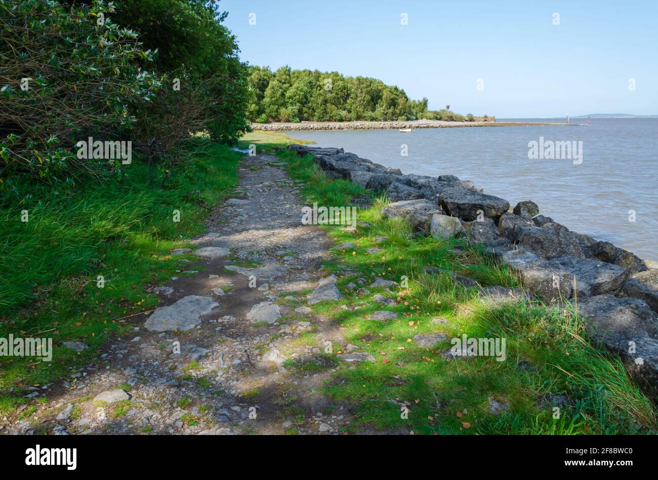 High tide at Flint Foreshore on the River Dee in North Wales following ...