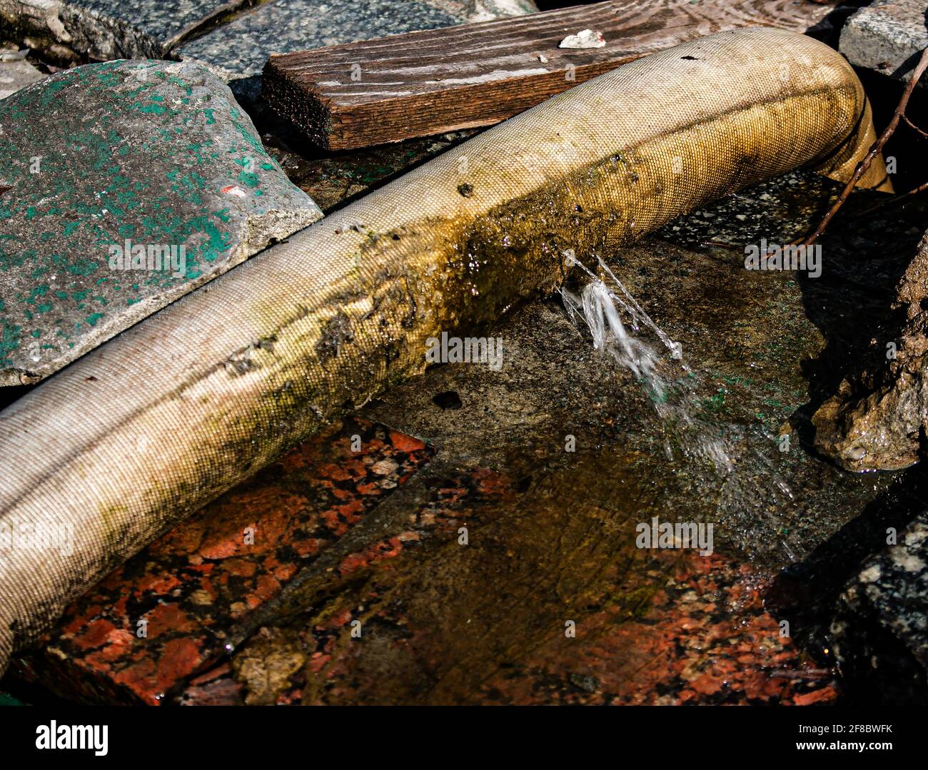 Leakage in the connection of the water pumping pipes. Breakthrough of ...