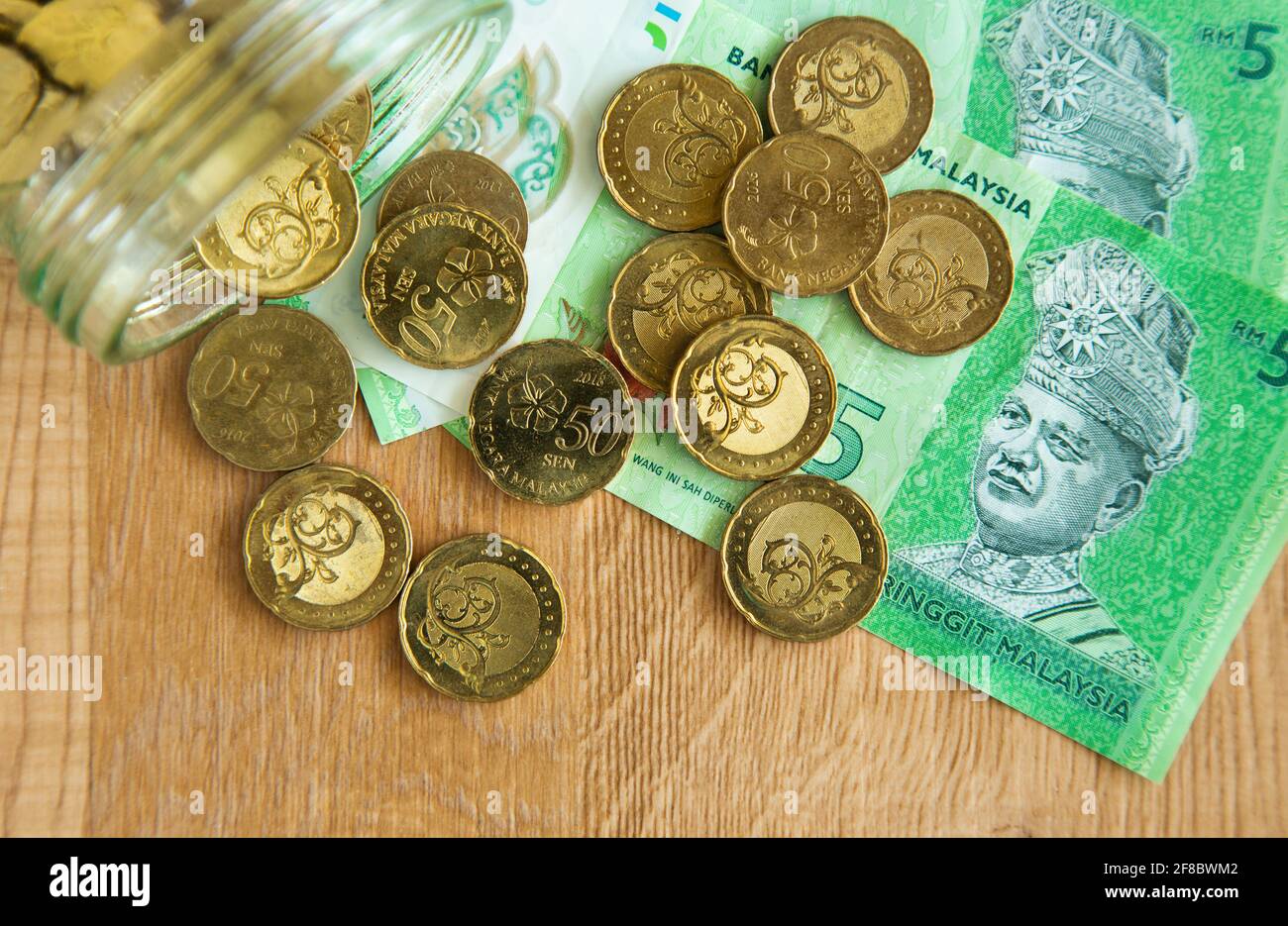 Financial background with money and coins Stock Photo - Alamy