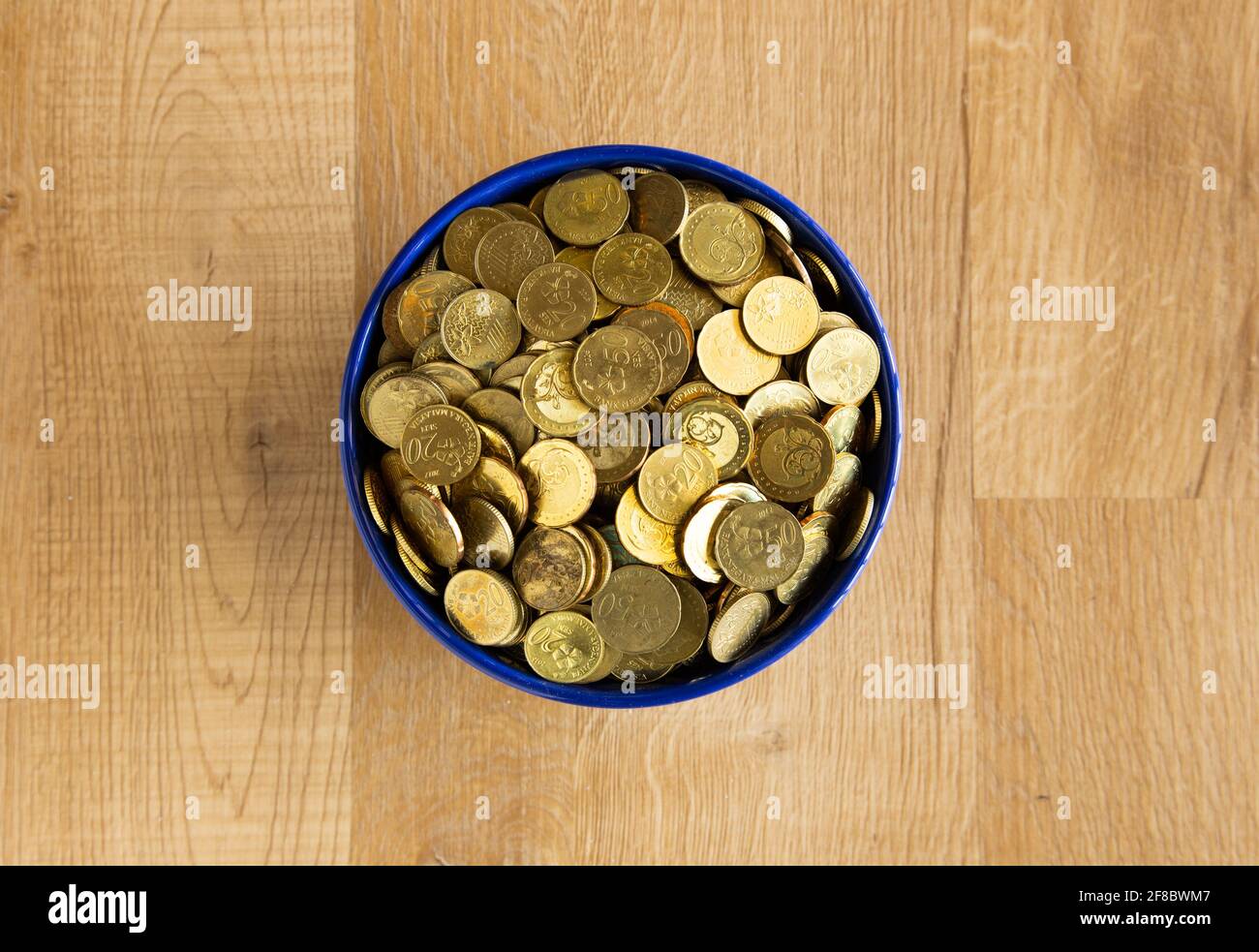 Coin bowl hi-res stock photography and images - Alamy
