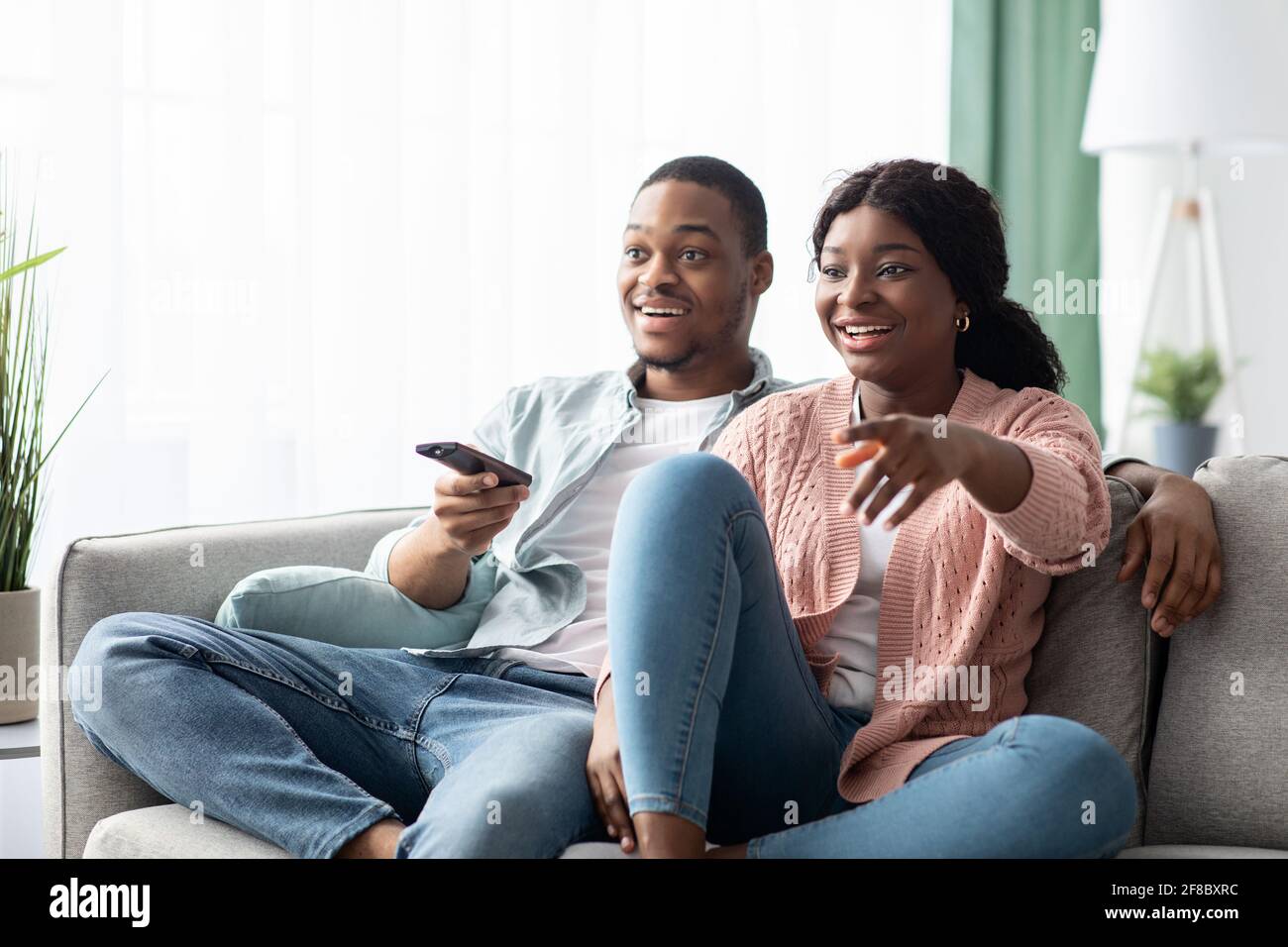 Black Family Watching Tv Together