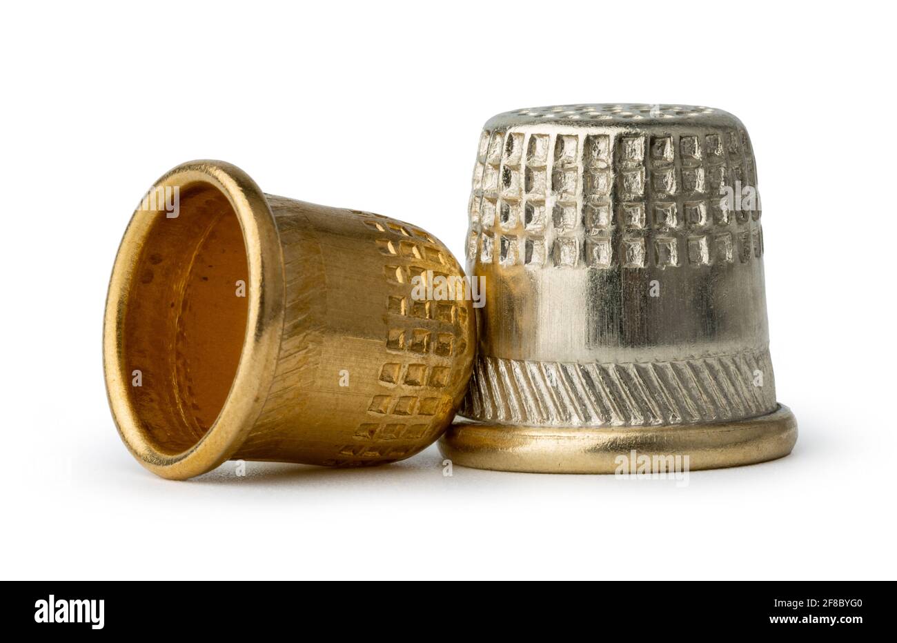 Metal sewing thimble isolated on white Stock Photo - Alamy