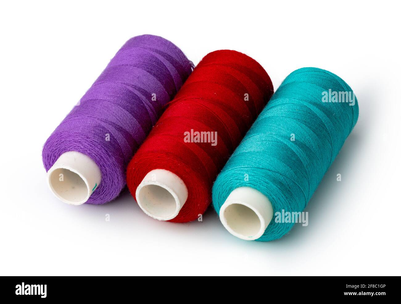 Color thread spool isolated on white background Stock Photo - Alamy