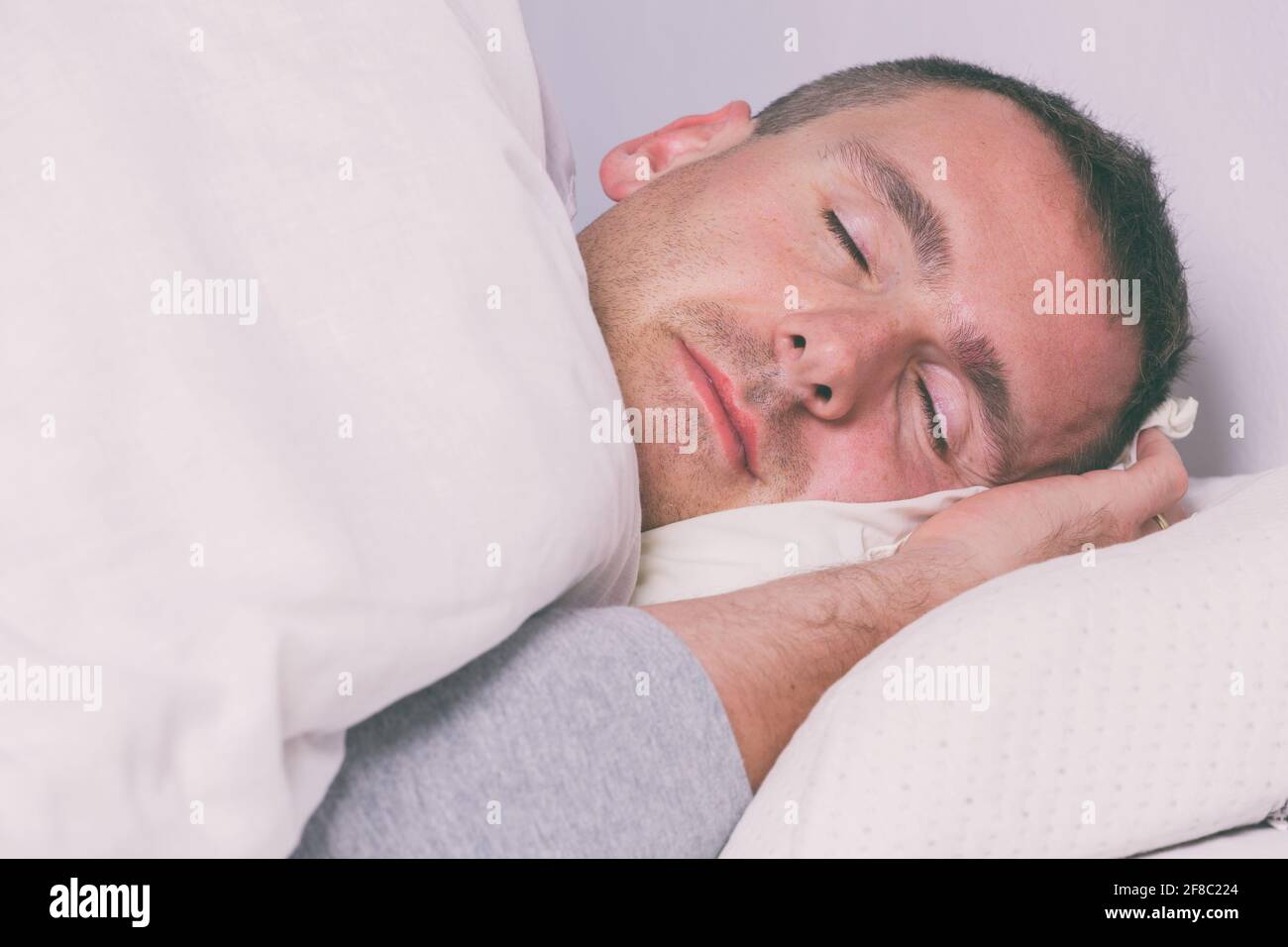 Man sleeping at home Stock Photo - Alamy
