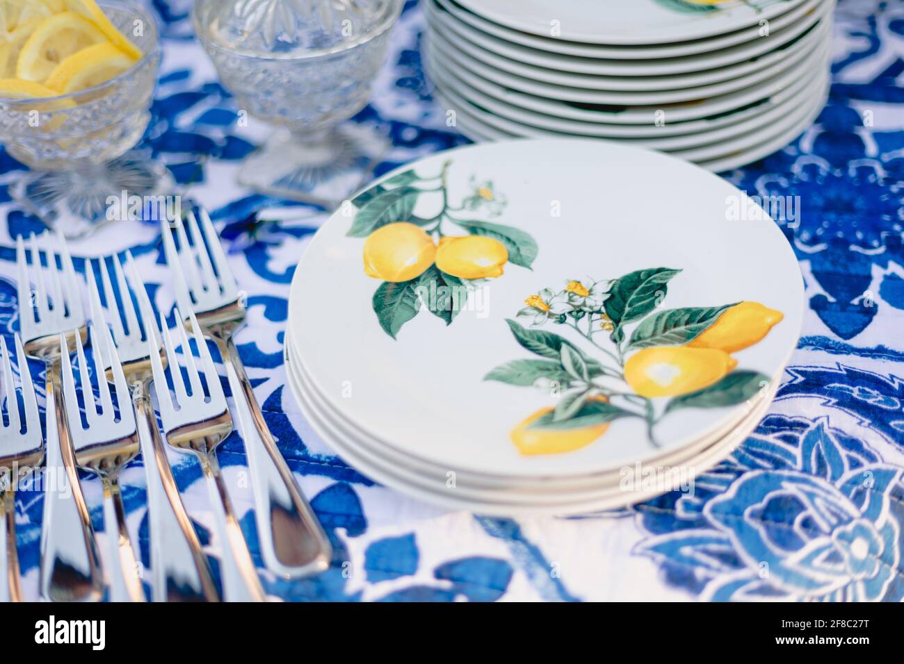 Navy blue and yellow table setting for outdoor wedding reception Stock ...