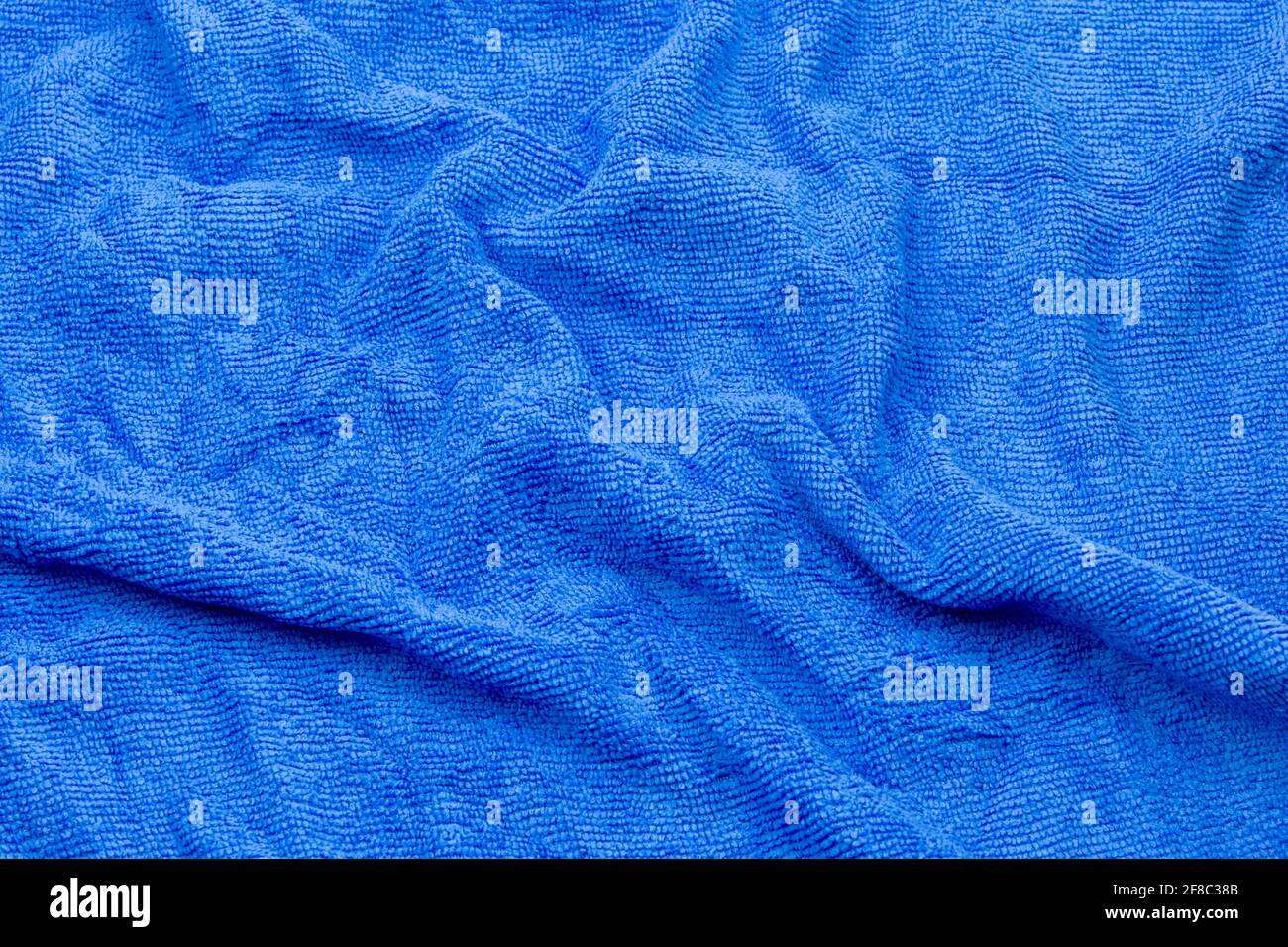 Blue microfiber cloth texture background Stock Photo - Alamy