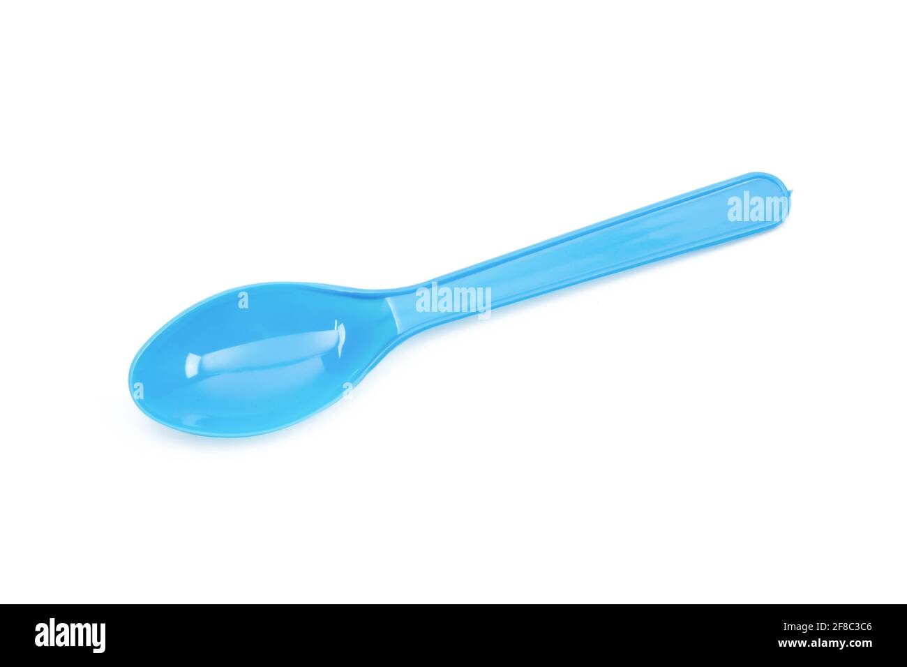 Blue plastic spoon isolated on white background Stock Photo - Alamy