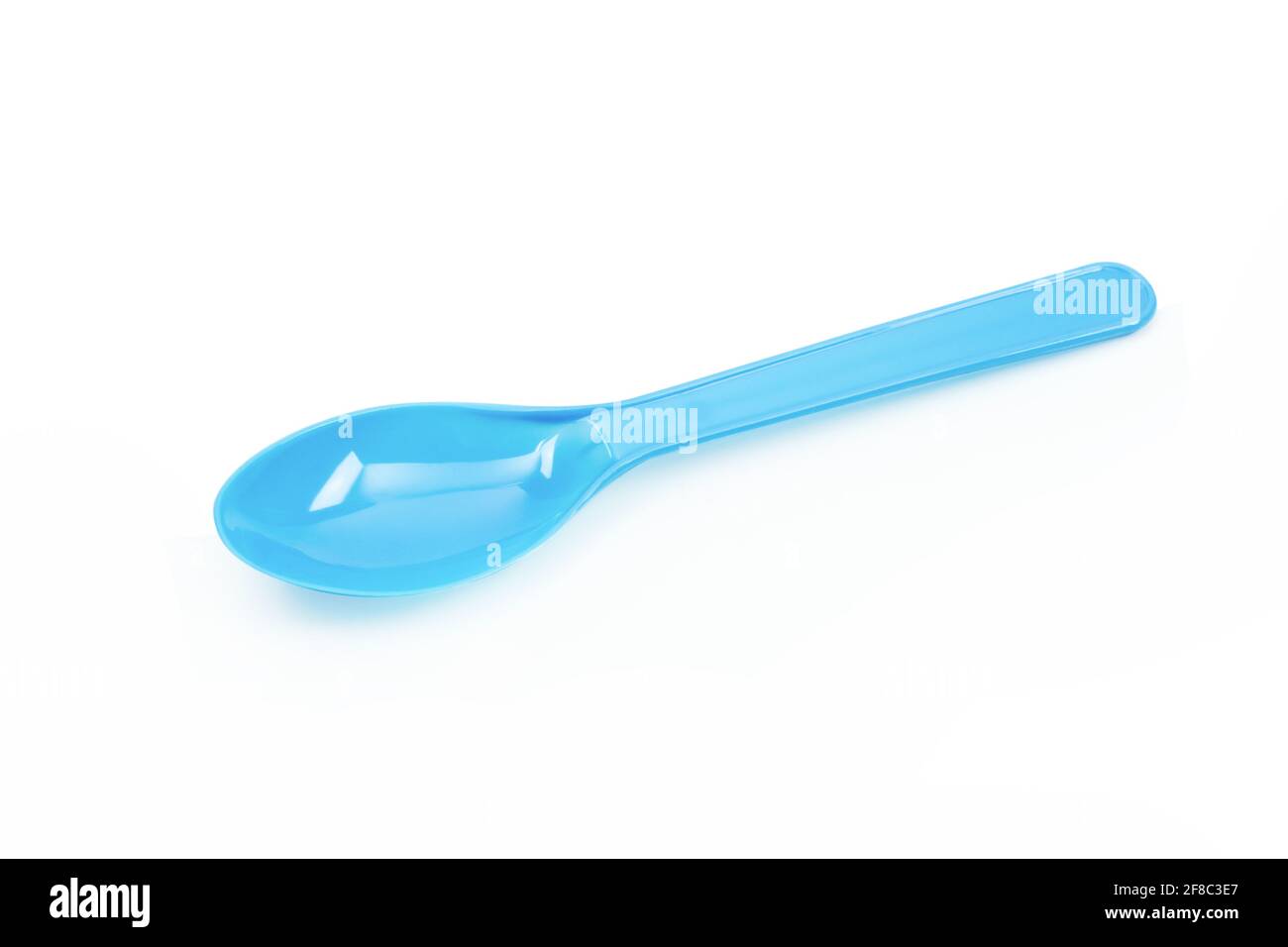 Blue plastic spoon isolated on white background Stock Photo - Alamy