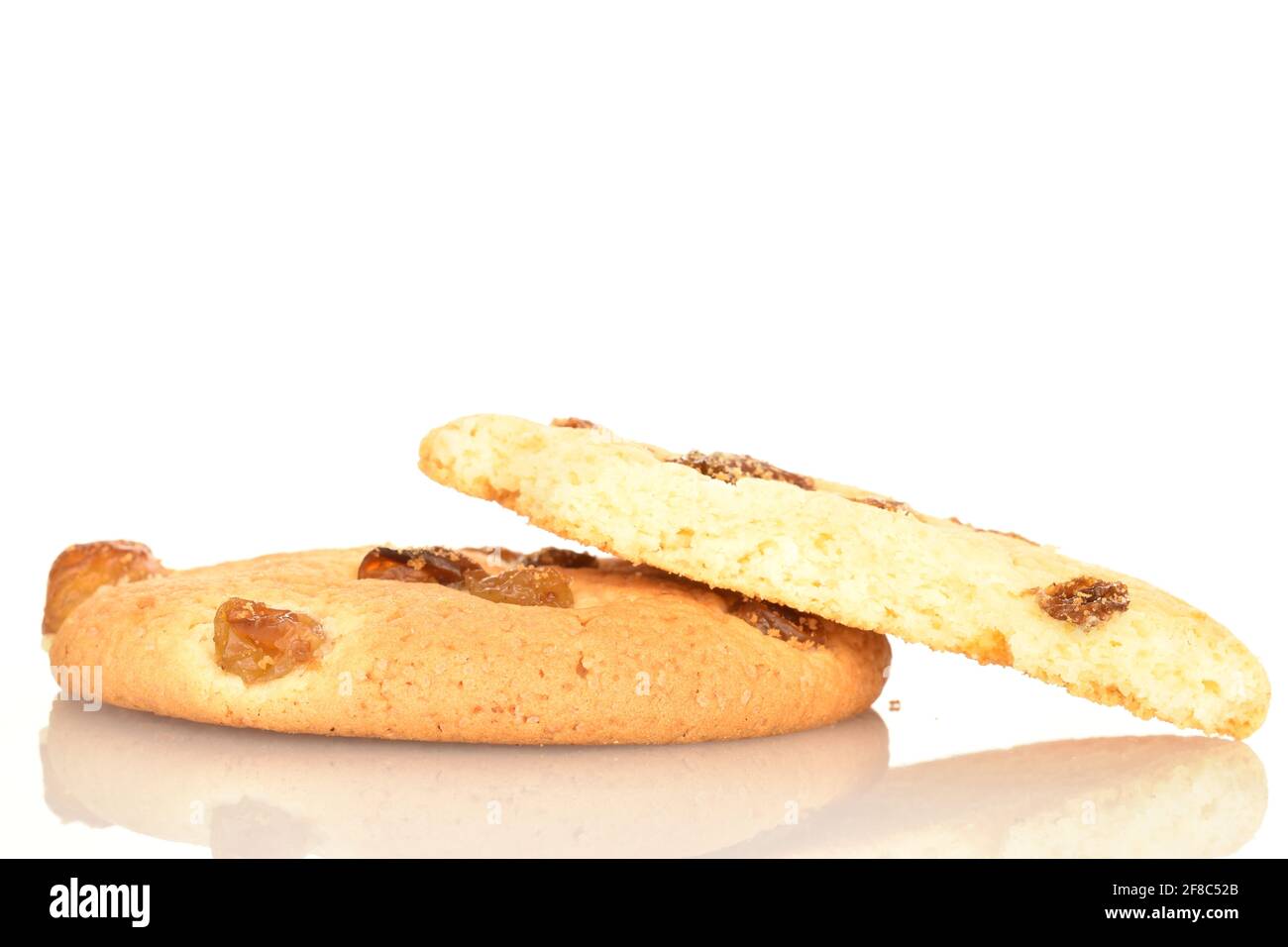 One whole and one half cookie, close-up, isolated on white Stock Photo ...
