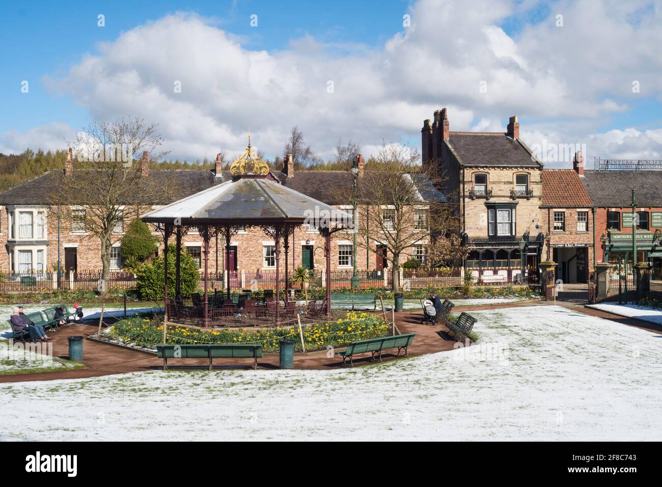 A light covering of snow at the bandstand and 1900s town within Beamish ...