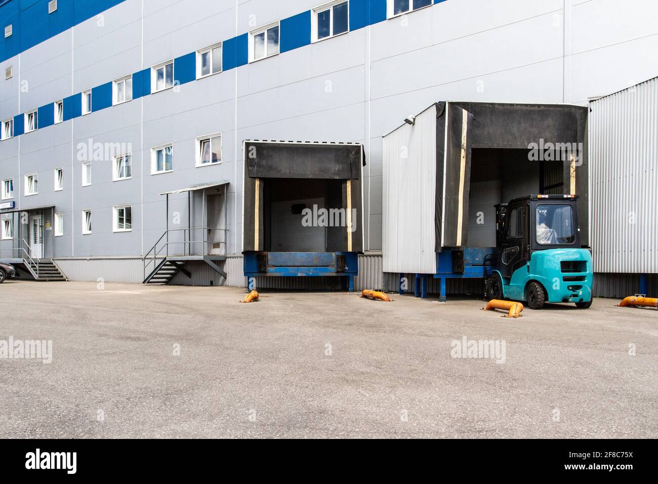 General view to the loading gates in the big distribution warehouse ...