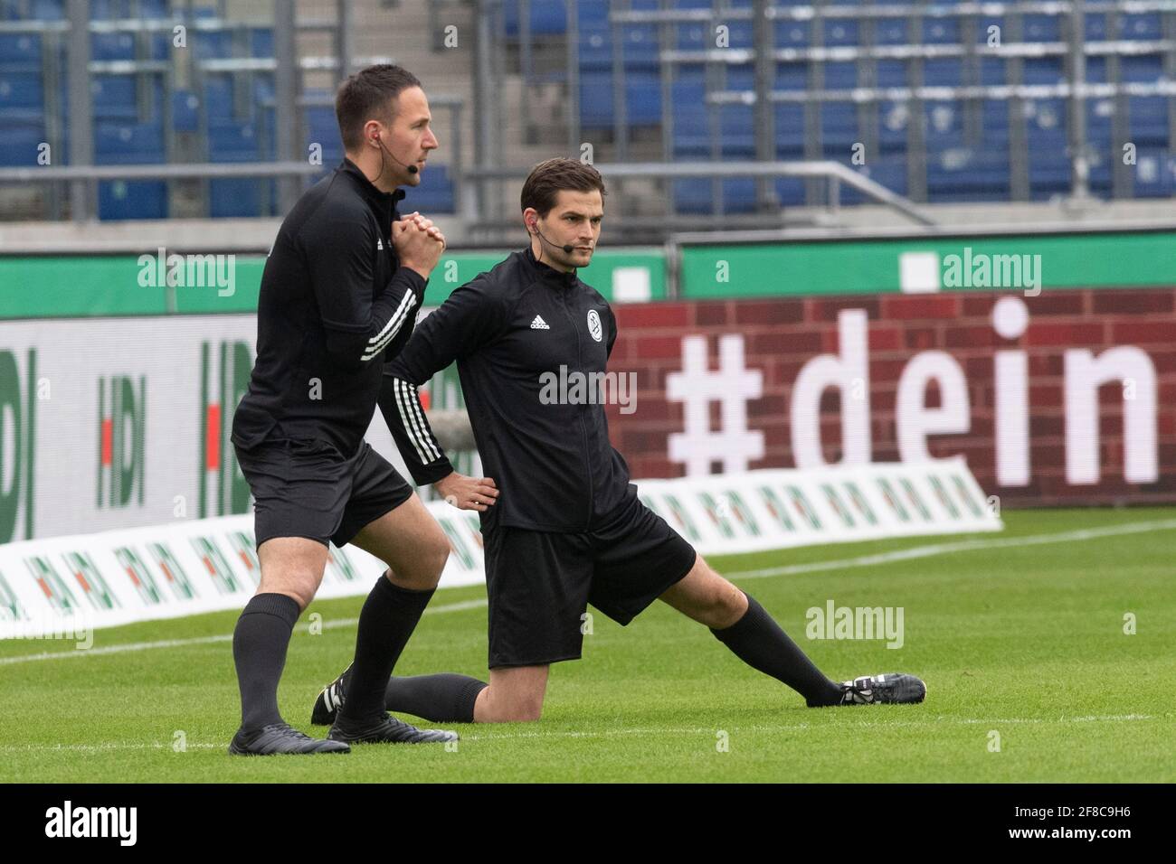 Referee assistant Henry MUELLER (left) and Max BURDA during warm-up ...