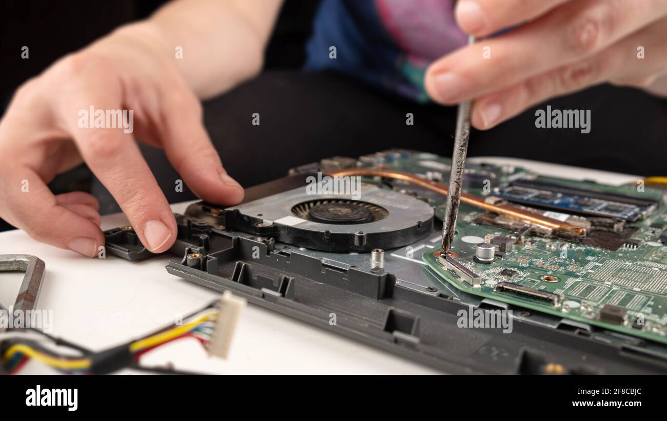 Laptop repair hi-res stock photography and images - Alamy