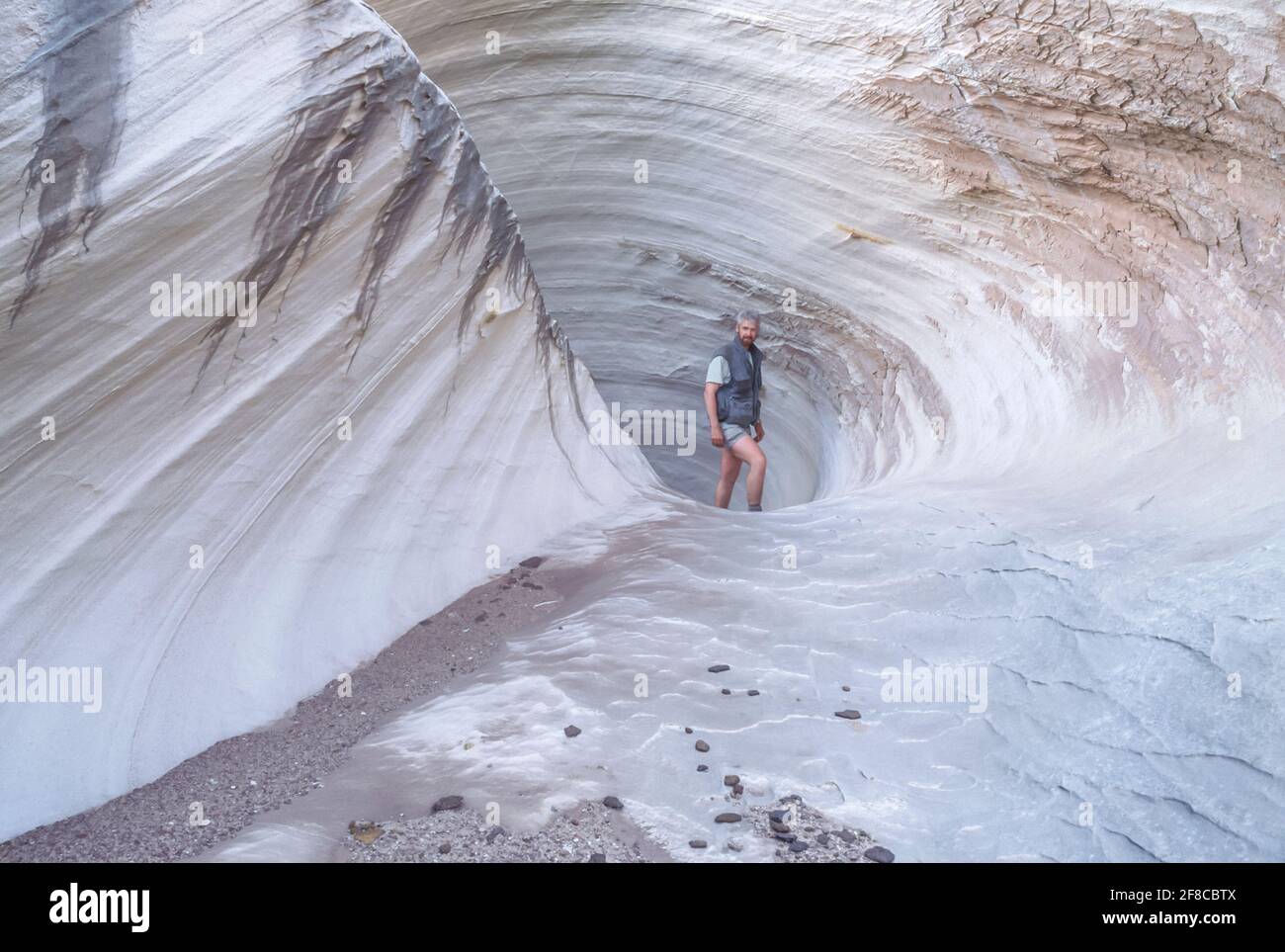 self portrait of john lambing in a white sandstone slot canyon near ...
