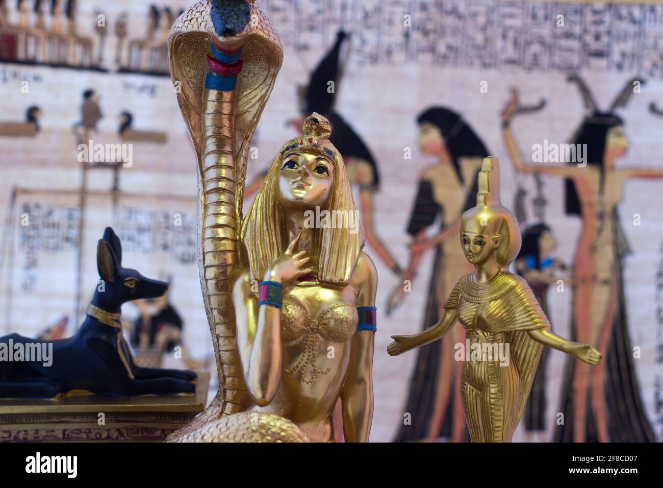 Still life with egyptian figures of anubis, cleopatra, snake and the ...