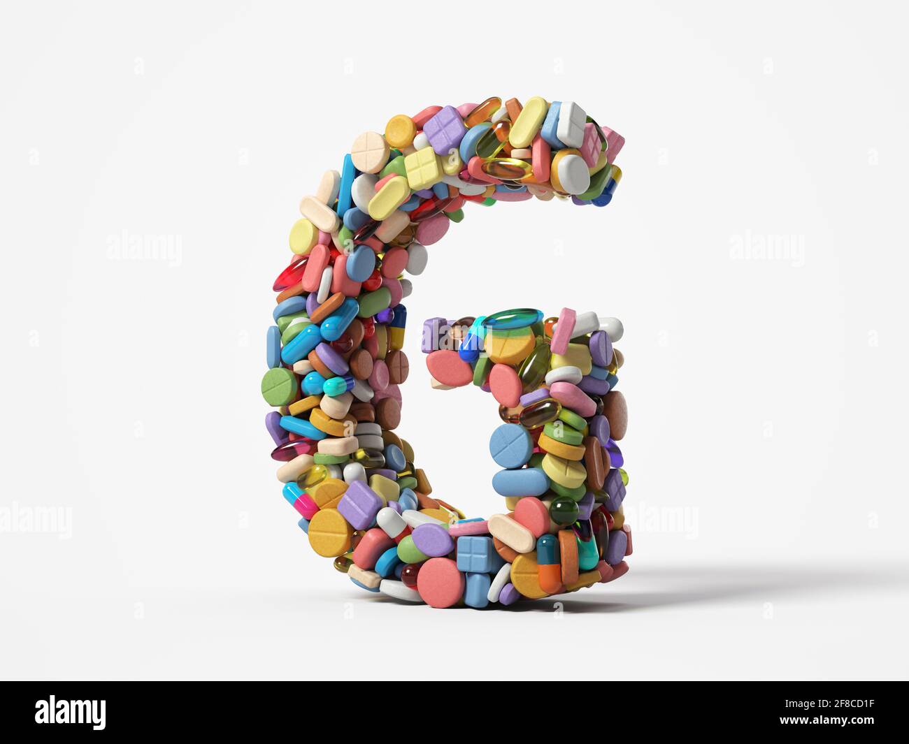 different pills stack in shape of letter G. suitable for medicine ...