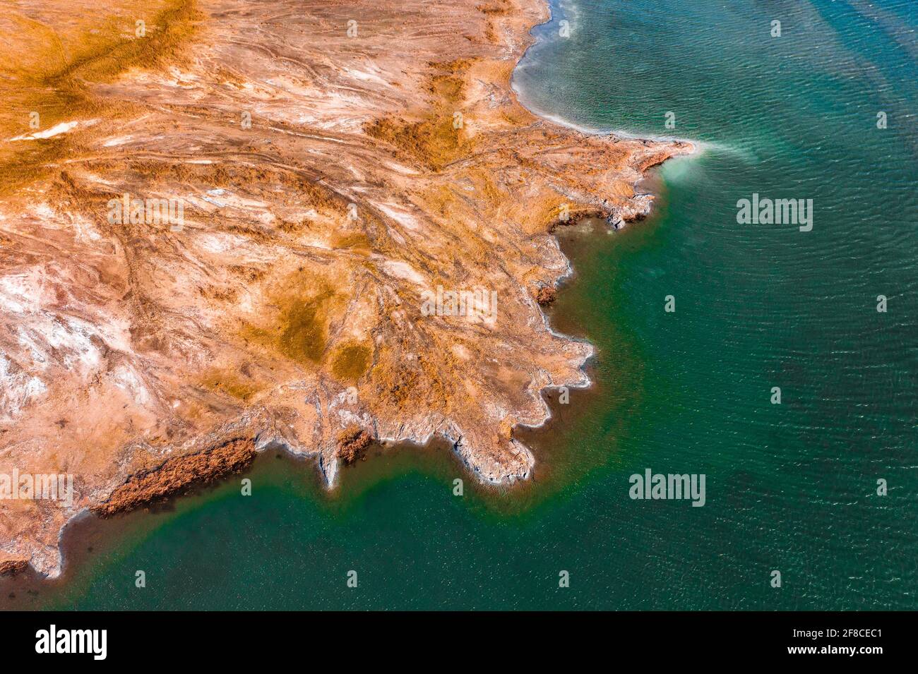 Aerial view about rocky seashore with turquoise waving water Stock ...