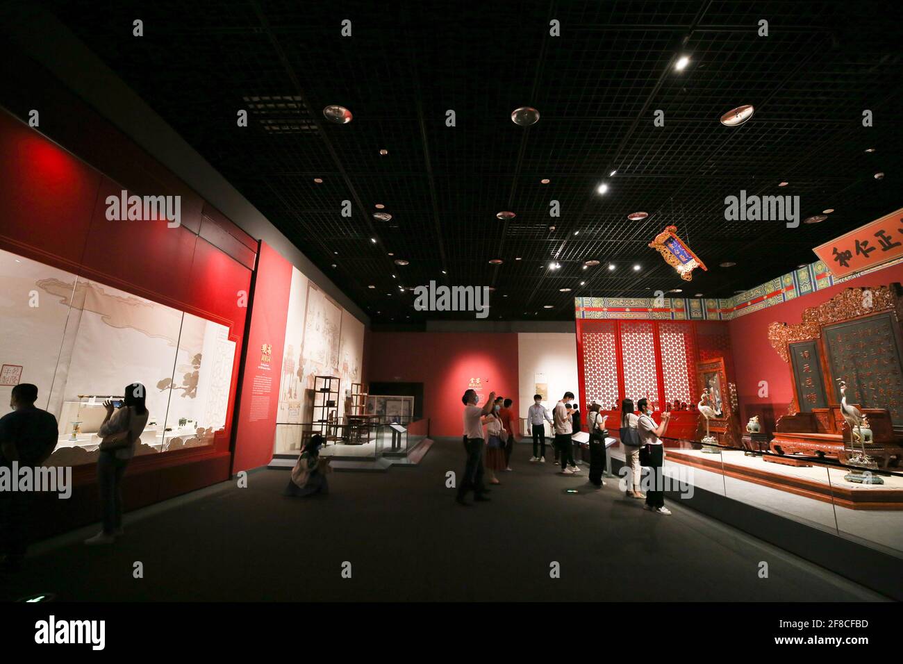 Haikou, China's Hainan Province. 13th Apr, 2021. Visitors view exhibits ...