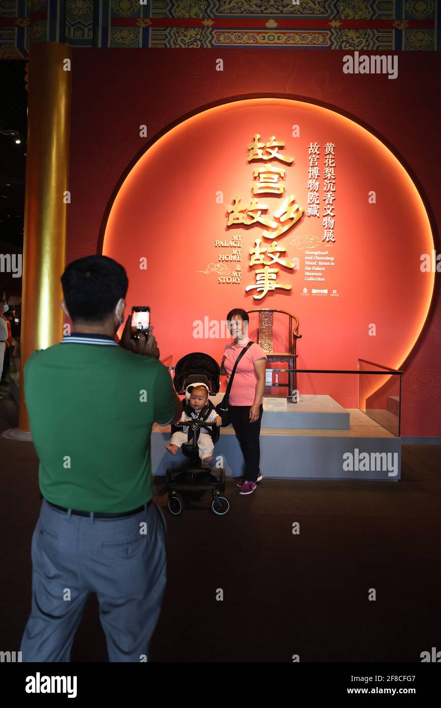 Haikou, China's Hainan Province. 13th Apr, 2021. Visitors take photos ...