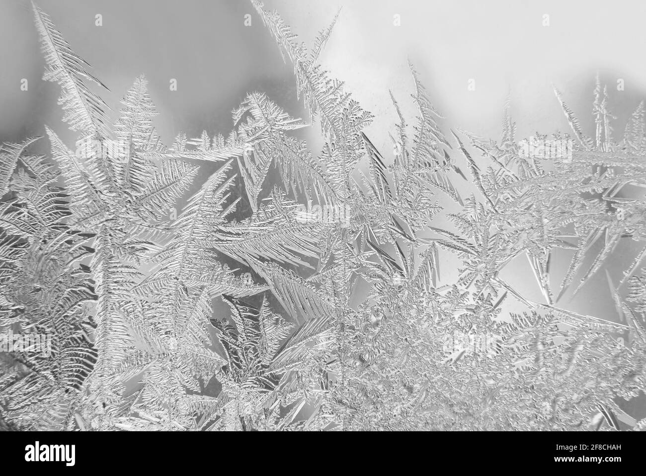 winter ice patterns on window Stock Photo - Alamy